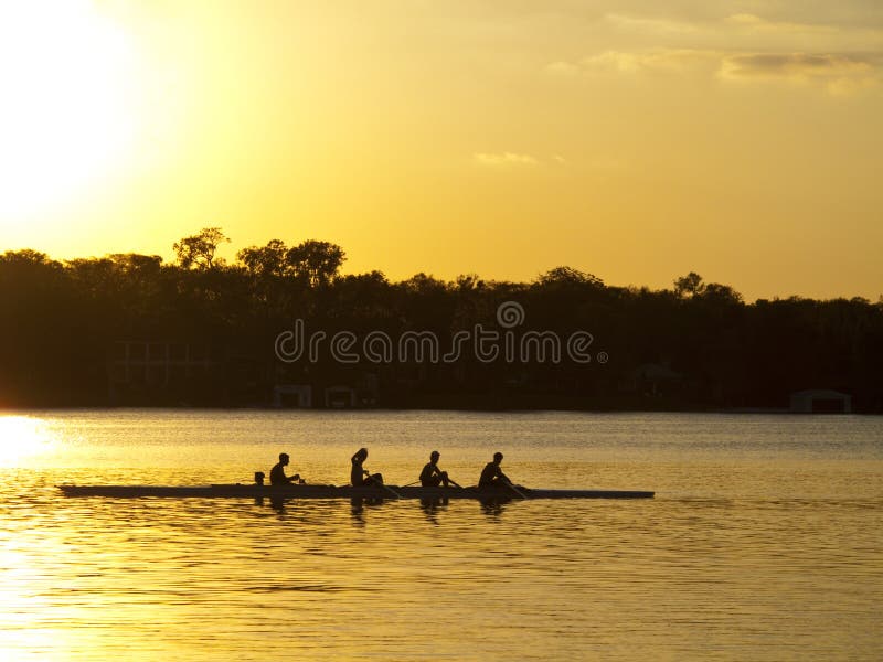 Sunset Rowing Crew stock photo. Image of twilight, team - 4586910