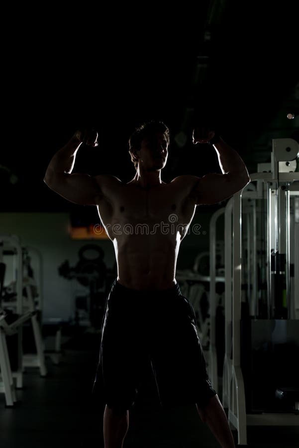 Siluet Bodybuilder Performing Front Double Biceps Pose Stock Photo ...