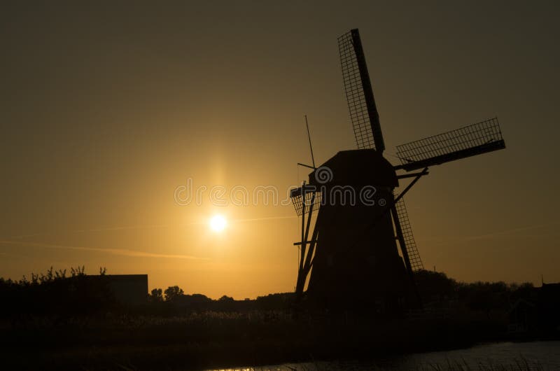 Siluet of Dutch Windmill in Sunset Stock Photo - Image of architecture ...