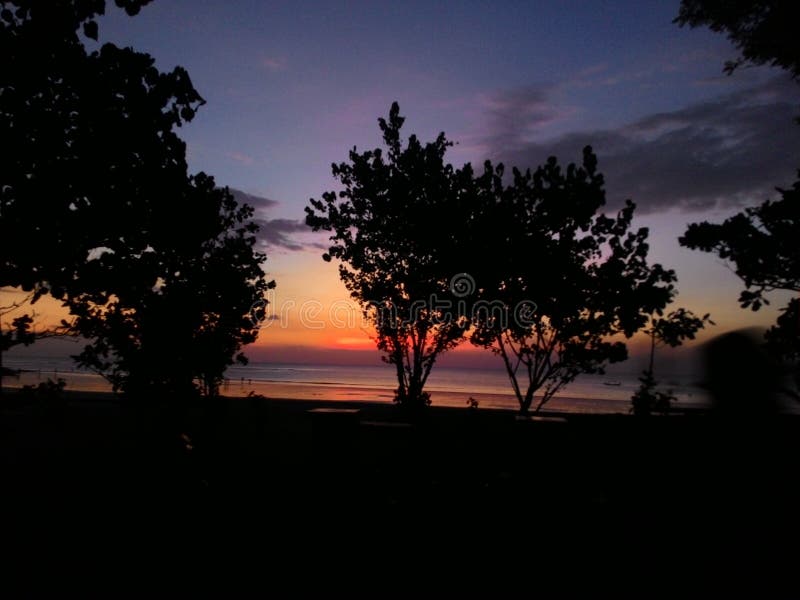 Siluet in sunset stock photo. Image of bali, dusk, kuta - 53949008