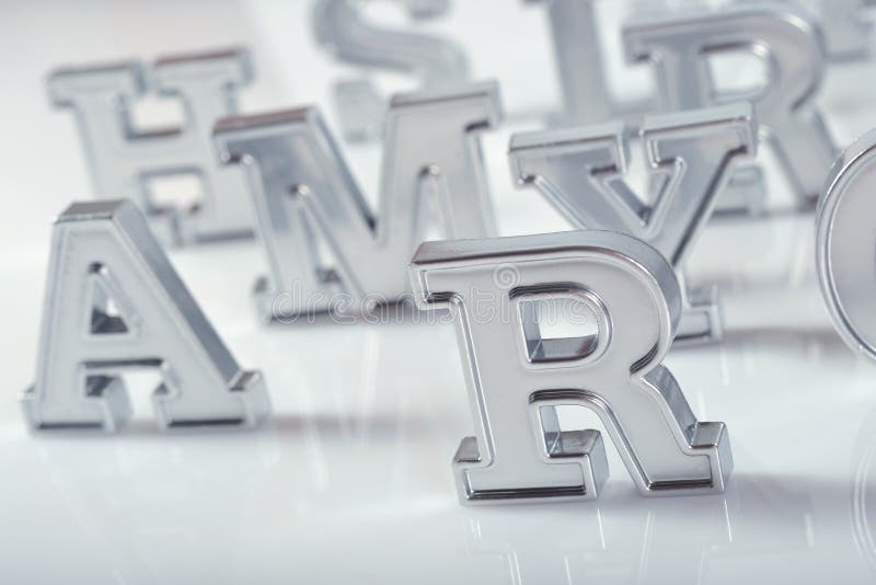 Silver Alphabet Letters Close-up on a White Stock Illustration ...