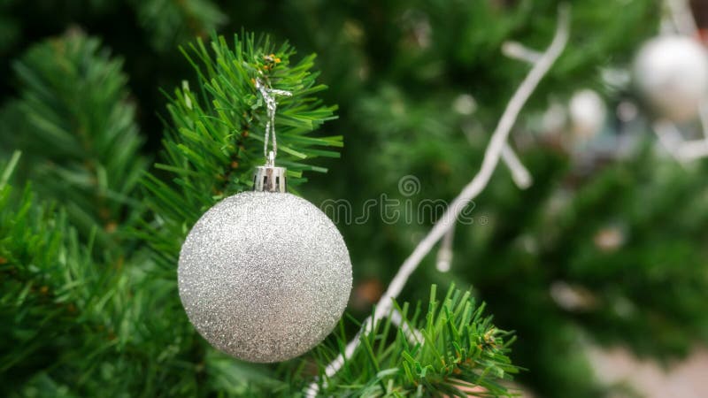 Silver Ball Hanging on a Christmas Tree Stock Image - Image of gold ...
