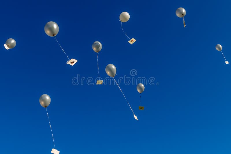 Silver Balloons Going Up in the Blue Sky Stock Photo - Image of design ...