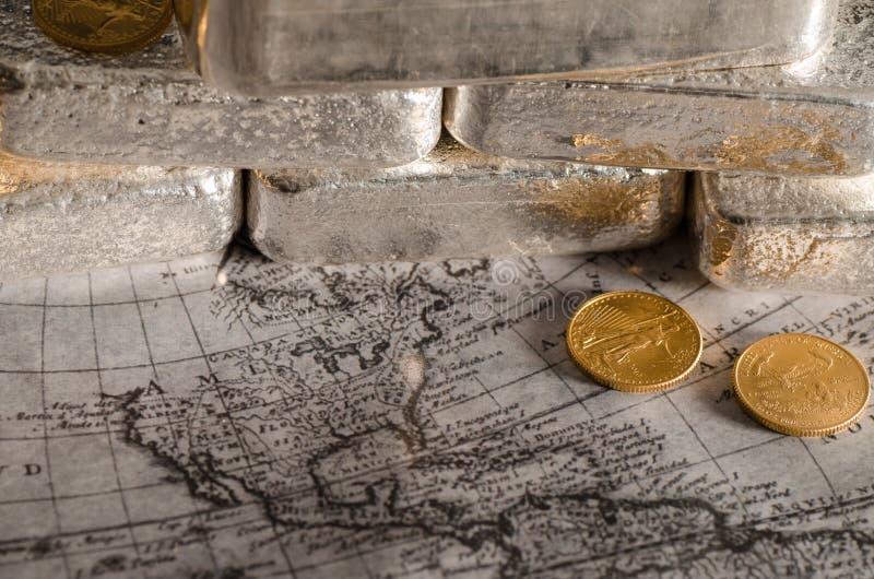 Silver Bars with Gold Eagle Coins on Map Stock Photo - Image of macro ...