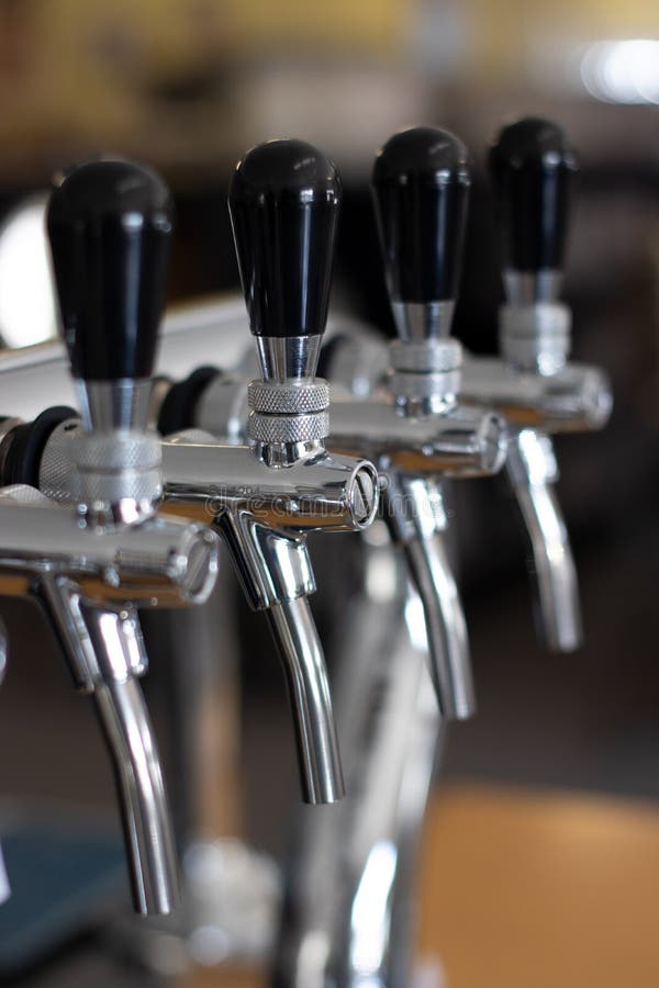 Silver beer draught taps stock image. Image of taste - 214023851