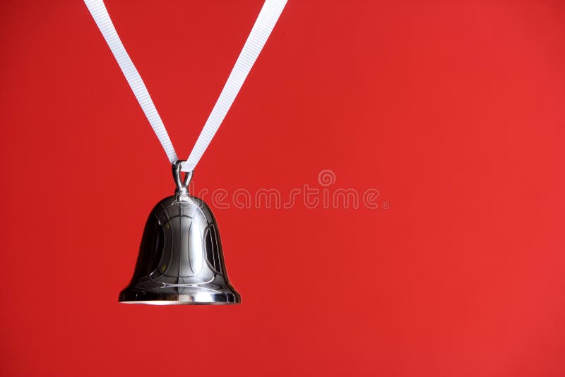 Silver Bell on Red stock image. Image of holiday, december - 10976635