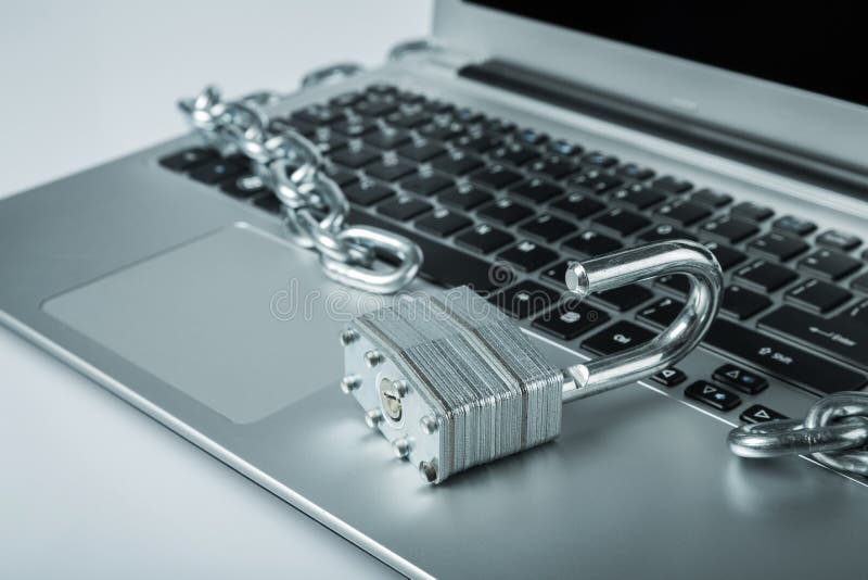 Silver Laptop with Big Lock and Icons on Table Stock Image - Image of ...