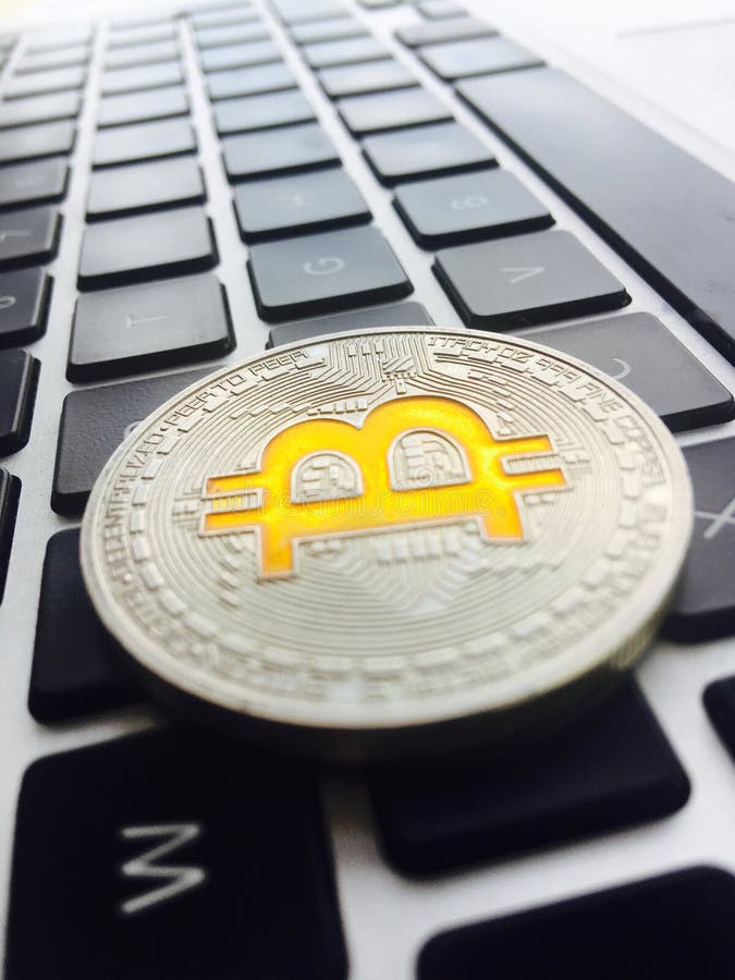 Silver Bitcoin Coin on Keyboard Stock Photo - Image of currency, trade ...
