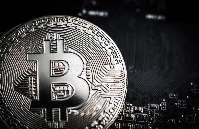 Silver Bitcoin on the Computer Motherboard Background Stock Image ...