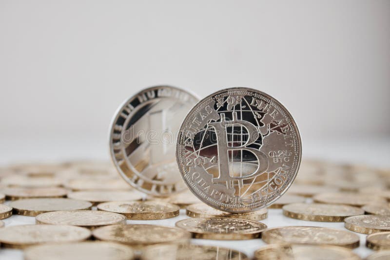 Silver Bitcoin and Litecoin Stock Photo - Image of litecoin, money ...