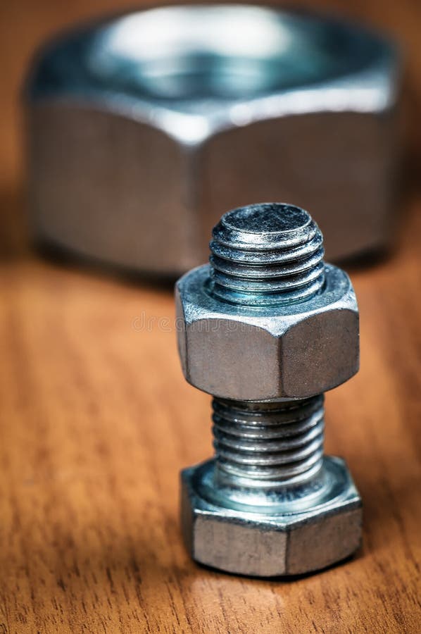 Silver bolt and nut stock photo. Image of small, working - 182136420