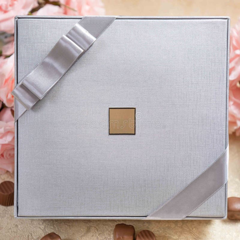 Silver box of chocolate stock image. Image of quality - 263160727