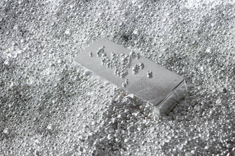 Silver Brick in Pieces of Silver Stock Image - Image of financial ...