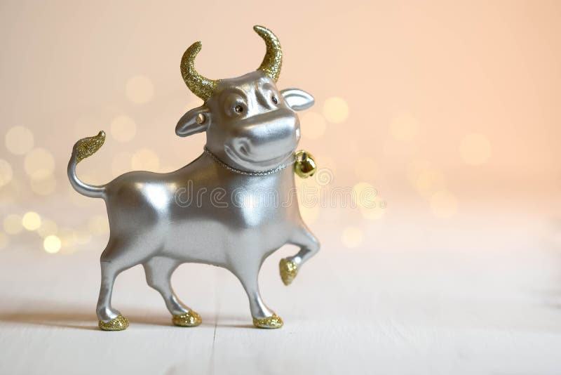 A Silver Bull Stands on a White Table Stock Photo - Image of decor ...
