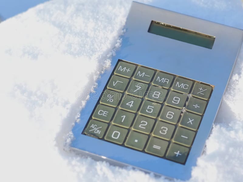 Silver Calculator with Keys in the Snow Stock Image - Image of contrast ...