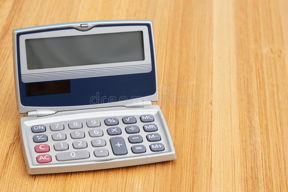 A Silver Calculator on Wood Desk Stock Photo - Image of school ...