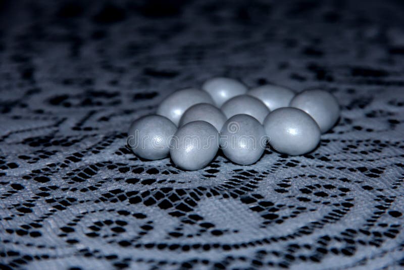 Silver Candies on a Lace Tablecloth Stock Image - Image of oval, sweet ...