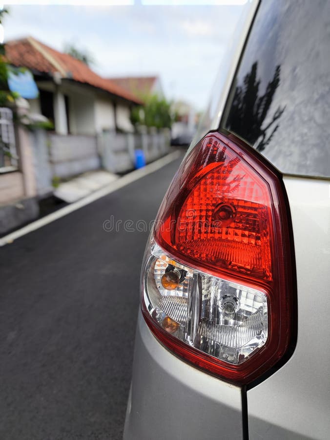 Silver Car with the Main Focus on the Stop Light Stock Photo - Image of ...