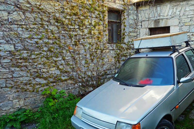 A Silver Car Near the Old Building Stock Image - Image of rubber ...
