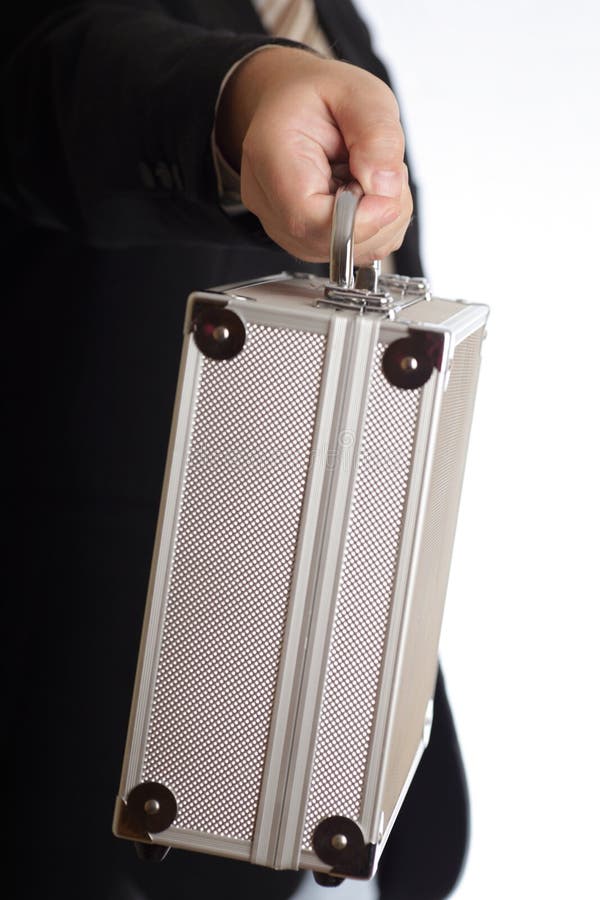 Silver case in hand stock image. Image of detail, modern - 16759367