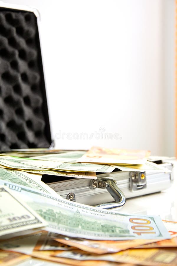A Silver Case is Open, Spilling Out US Dollar Bills Stock Image - Image ...