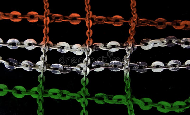 Silver Chain in Crisscross Pattern Painted Orange and Green Stock Photo ...