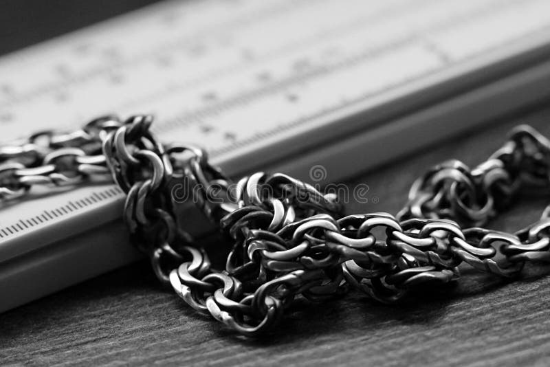 Silver Chain and Measuring Tool, Black and White Stock Photo - Image of ...
