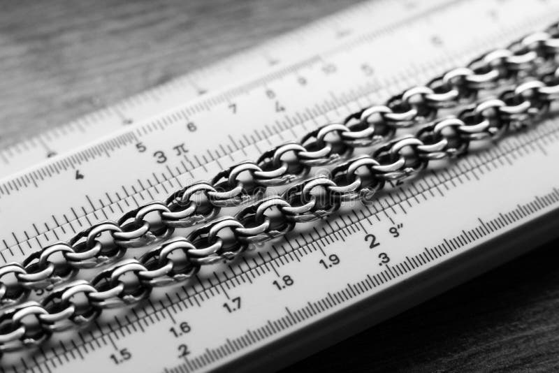 Silver Chain and Measuring Tool, Black and White Stock Photo - Image of ...