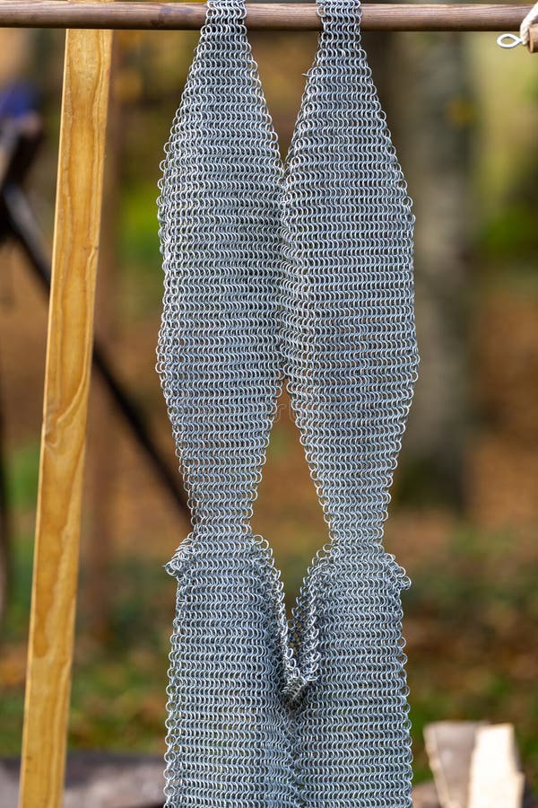 A Silver Chain with a Wooden Pole Holding it Stock Image - Image of ...