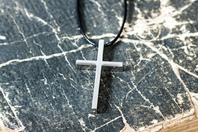 Silver Christian Cross on Bible Stock Image - Image of religious, book ...