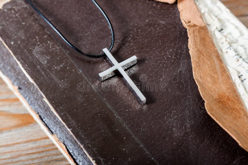 Silver Christian Cross on Bible Stock Image - Image of bury, paper ...
