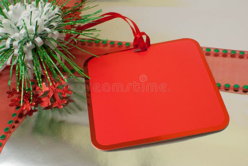 Silver Christmas Gift - Red Tag Stock Image - Image of green, ribbon ...