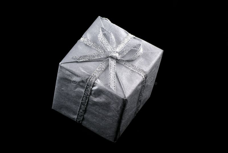 Silver christmas present. stock image. Image of ribbon - 3562883