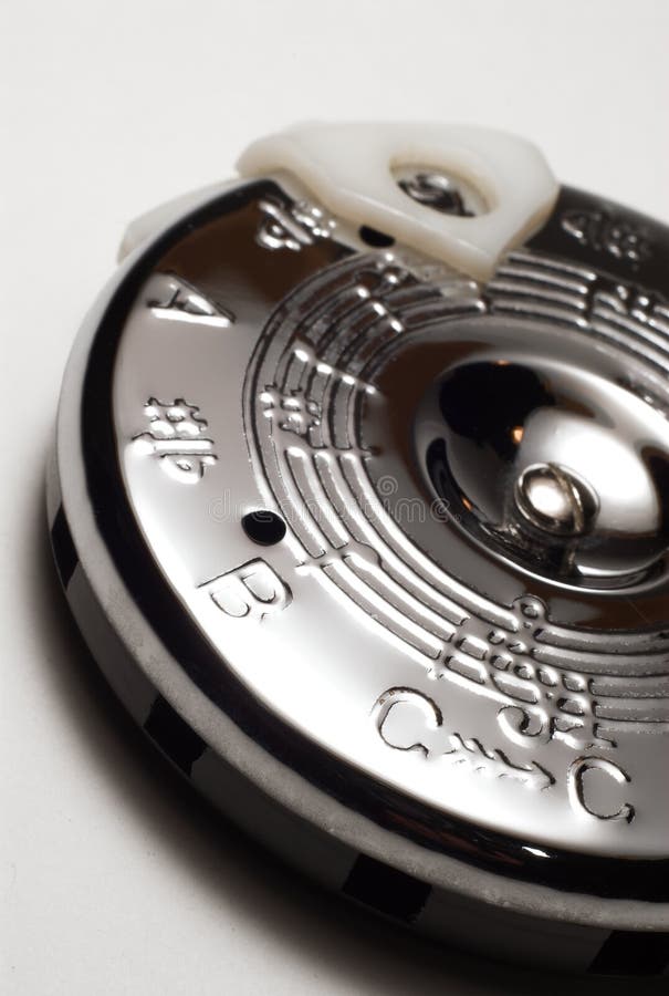 Silver Circle Pitch Pipe for Music Stock Photo - Image of talent ...