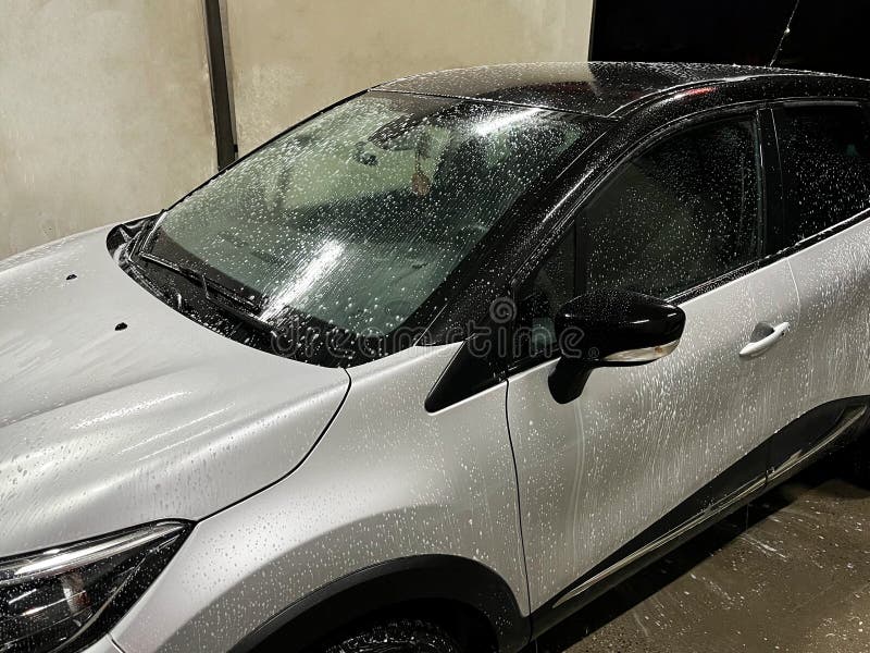 Silver-colored Car Wash at a Self-service Car Wash. Washing the Car ...