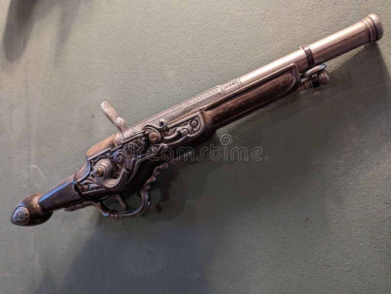 Silver-colored Gun Mounted on a Wall Inside of a Museum Editorial Photo ...