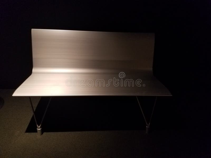 Silver Colored Metal Bench Half in the Dark Stock Photo - Image of ...