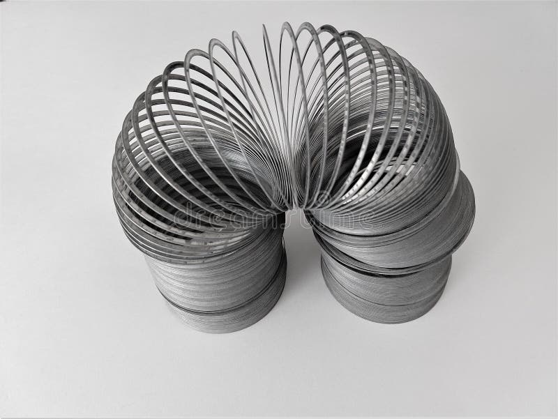 Aerial View of Metal Slinky Toy Editorial Stock Image - Image of loops ...