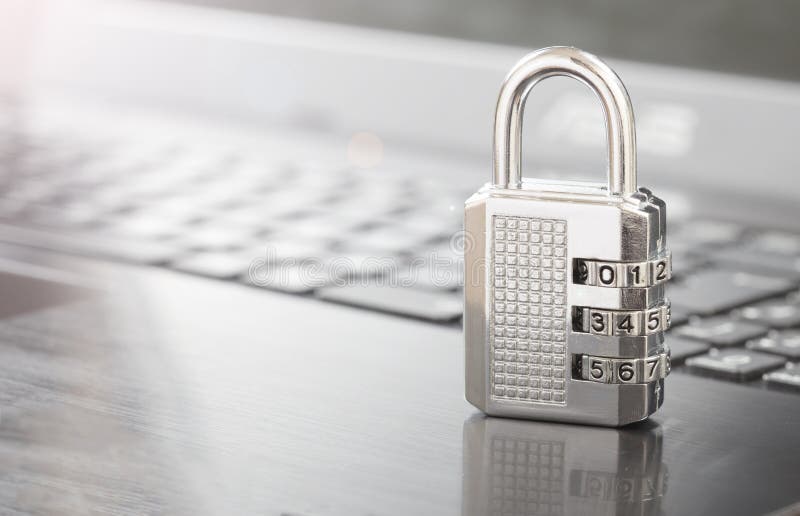 Silver Combination Lock on Keyboard.cyber Security Concept Stock Photo ...