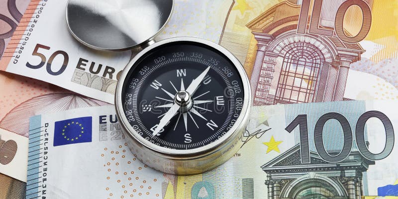 Silver Compass on Euro Banknotes, Symbol of Adventure and Wealth Stock ...