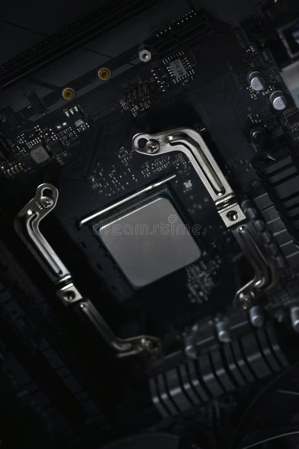 Silver Computer Processor on a Black Motherboard Stock Image - Image of ...