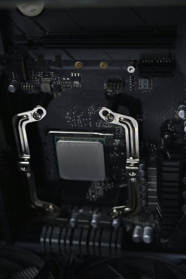 Silver Computer Processor on a Black Motherboard Stock Image - Image of ...