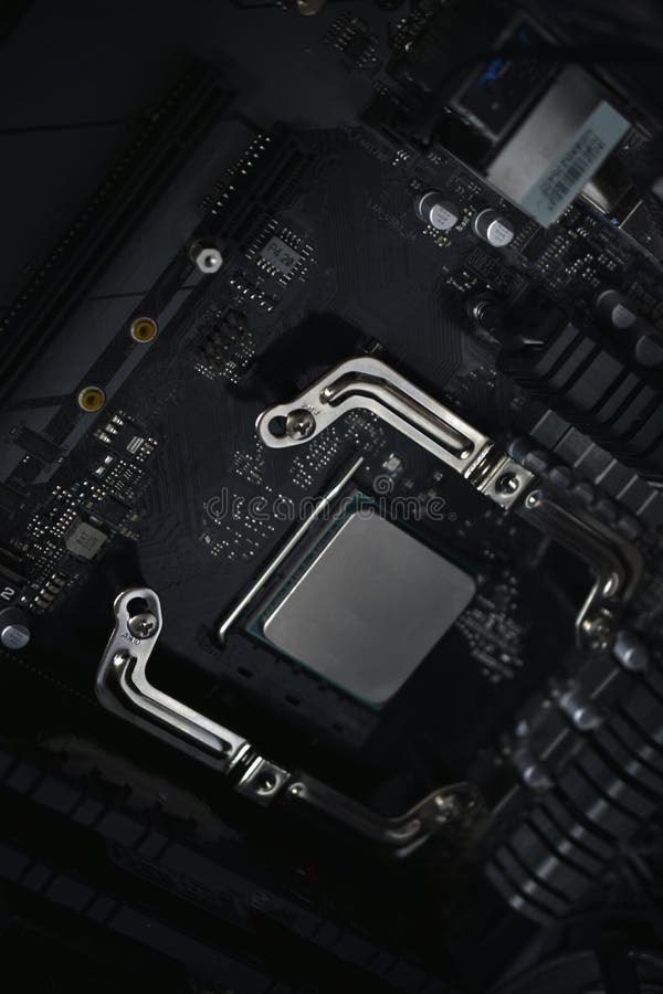 Silver Computer Processor on a Black Motherboard Stock Image - Image of ...