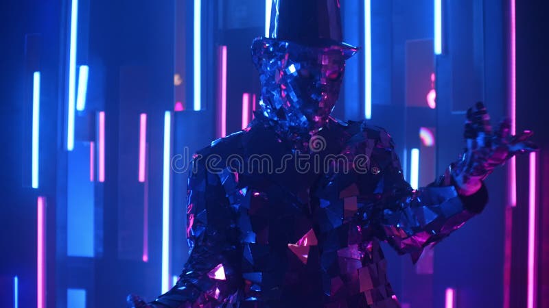 A Silver Dancing Man in a Glittering Metal Suit Dances Stock Video ...