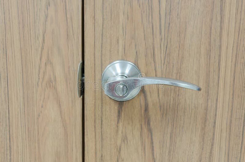 Silver Door Lock with Wooden Ground Stock Image - Image of modern ...