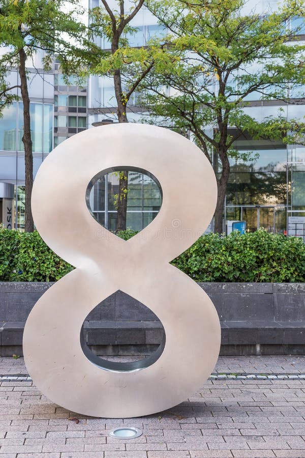 Silver Eight in Front of Modern Office Buildings Stock Image - Image of ...