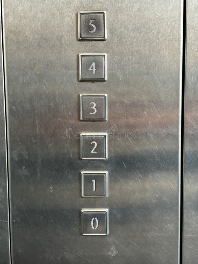 The Silver Elevator Has a Number of Buttons on it Stock Photo - Image ...