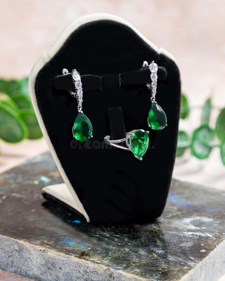 Silver Emerald Jewelry Set Standing on Black Display Stock Image ...