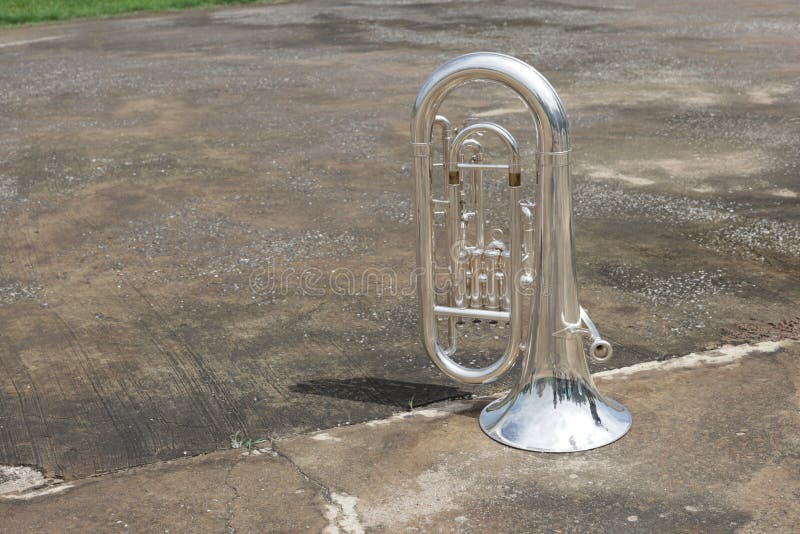 The Silver Euphonium Instrument Sits on an Outdoor Floor, Selectable ...
