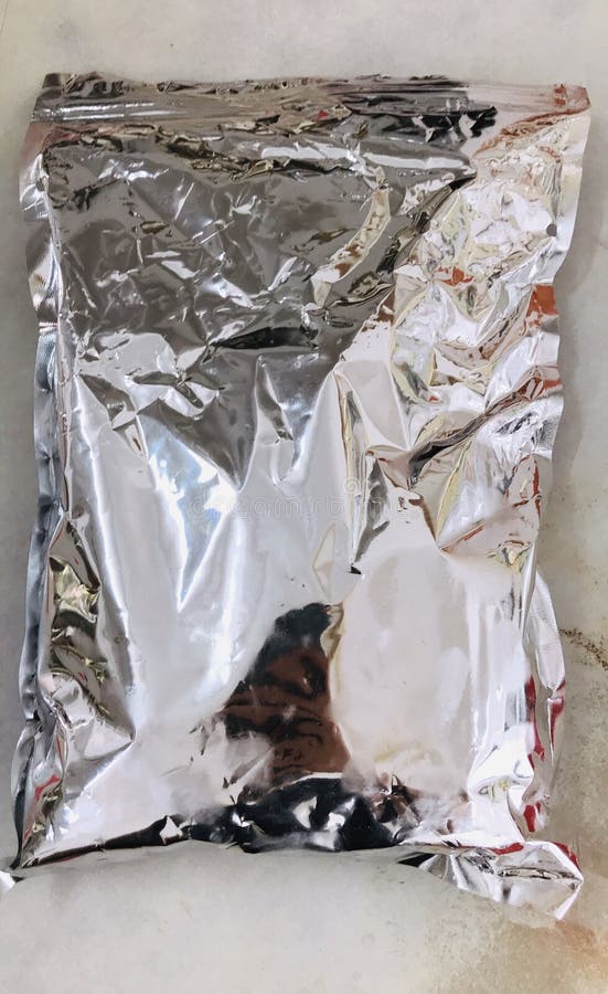 Silver food pack stock photo. Image of table, silver - 188483900